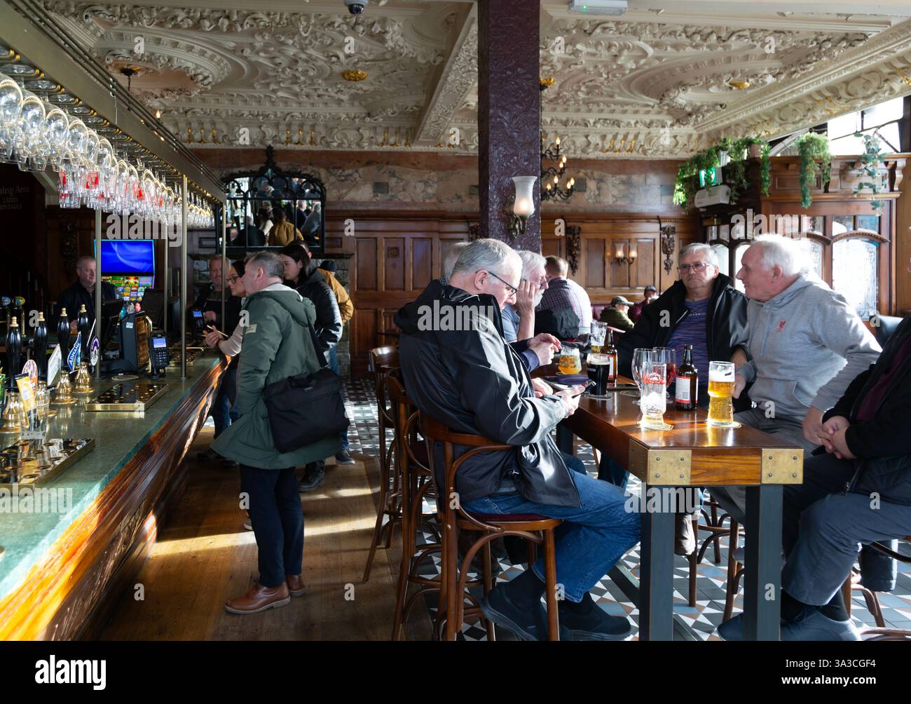 Customers in public bar inside Crown Hotel pub in city centre of ...