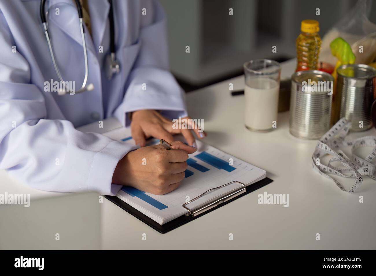 Dietary Assessment and Planning. A healthcare professional documenting ...