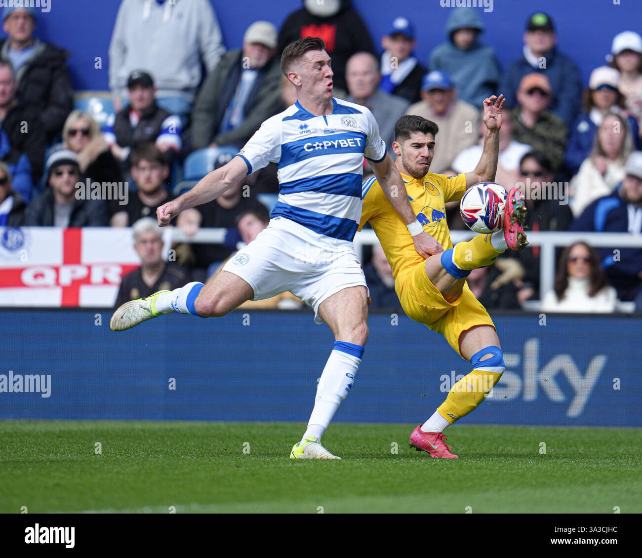 Jimmy Dunne of Queens Park Rangers and Manor Solomon of Leeds United ...