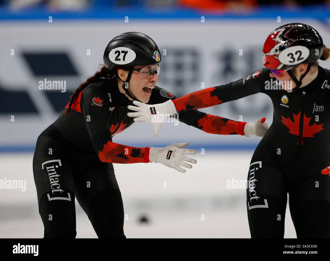 Beijing, China. 15th Mar, 2025. Canada's Florence Brunelle (L) and Kim ...