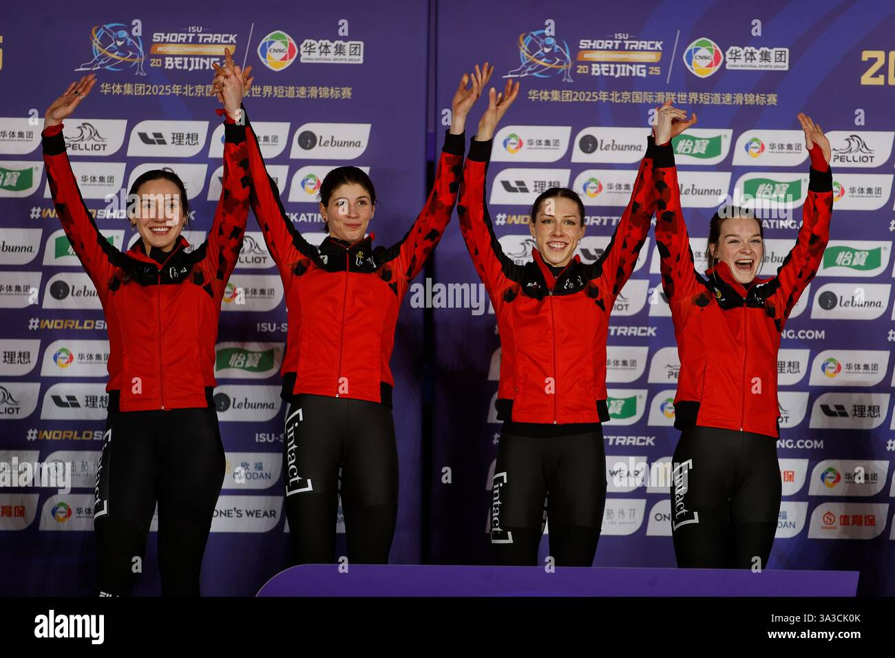 Beijing, China. 15th Mar, 2025. First-placed team Canada celebrate during the women's 3000m ...