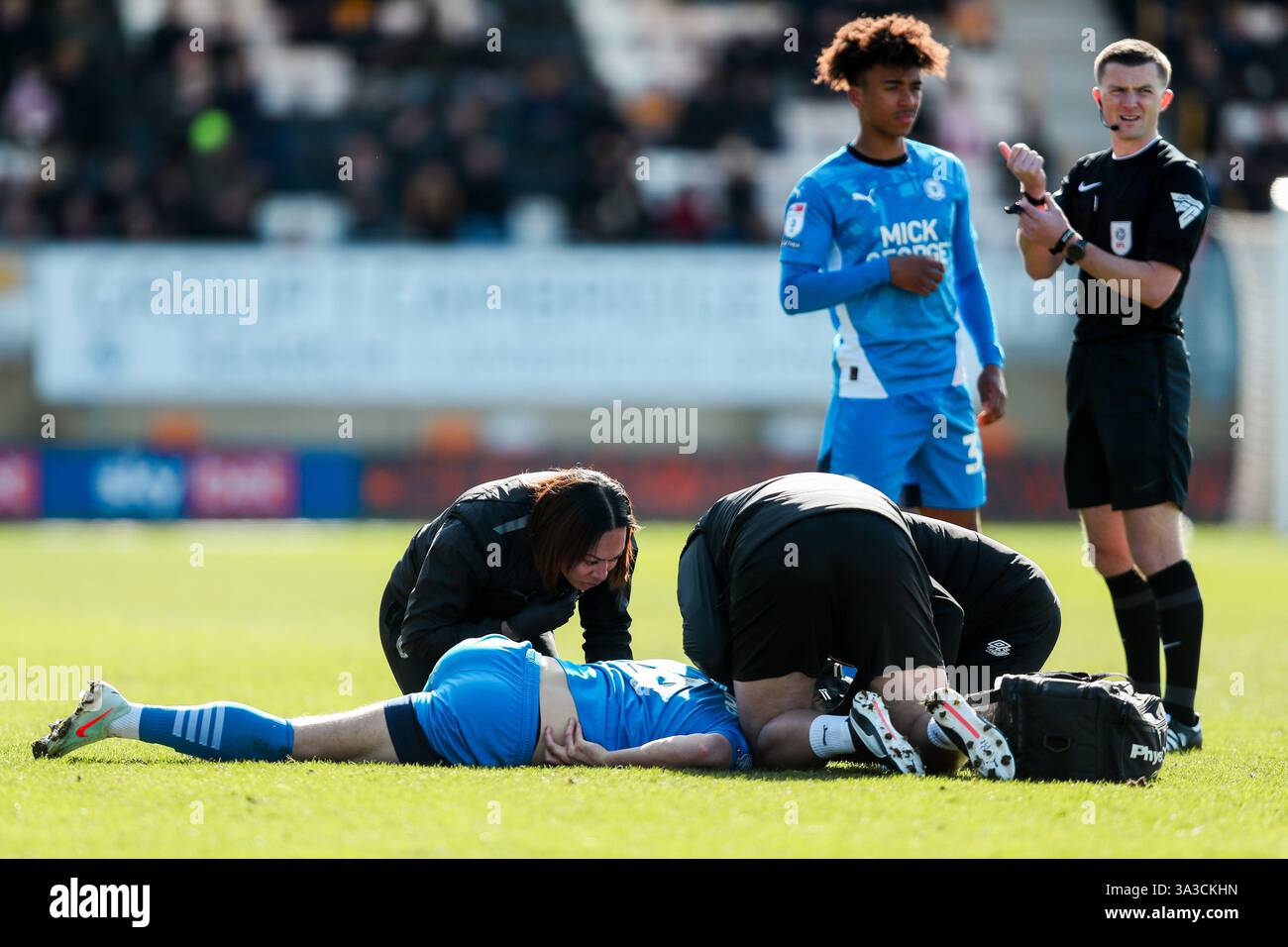 Cambridge, UK. 15th Mar, 2025. Archie Collins of Peterborough United ...