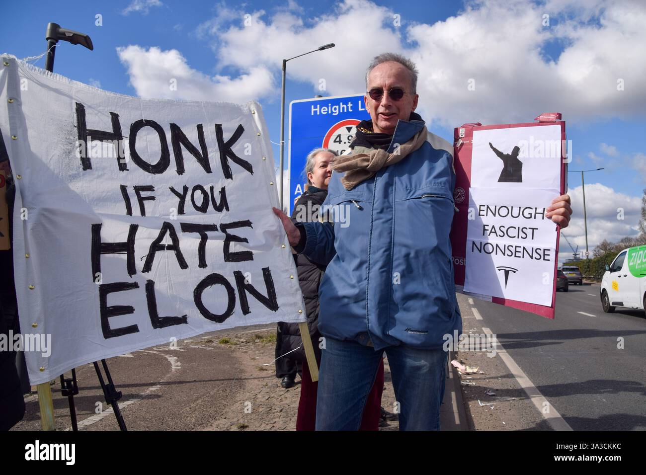 March 15, 2025, London, England, UK: A protester holds anti- Elon Musk ...