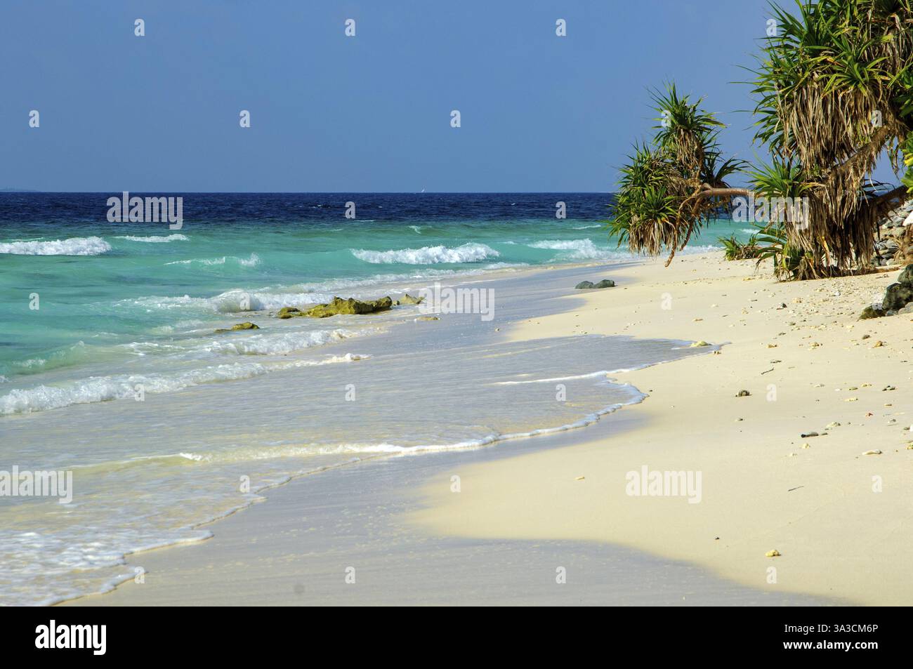 Bright blue little waves island hi-res stock photography and images - Alamy