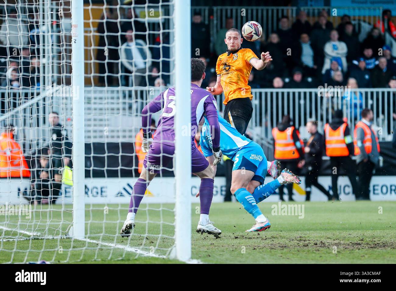 Ryan Loft of Cambridge United heads the ball during the Sky Bet League ...
