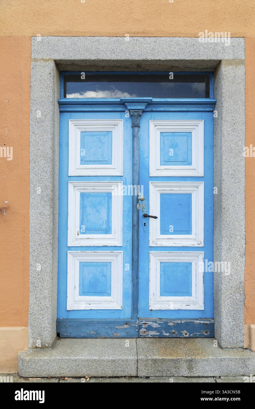 Historic wooden door in blue and white on the market square in ...