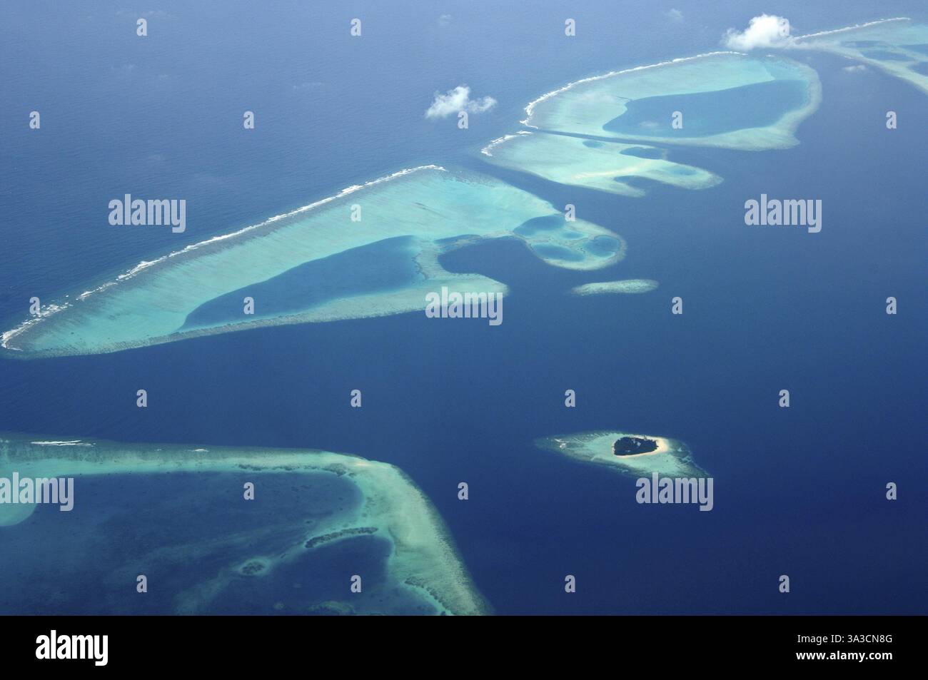 Aerial view from above left open Indian Ocean edge of atoll Maldives ...