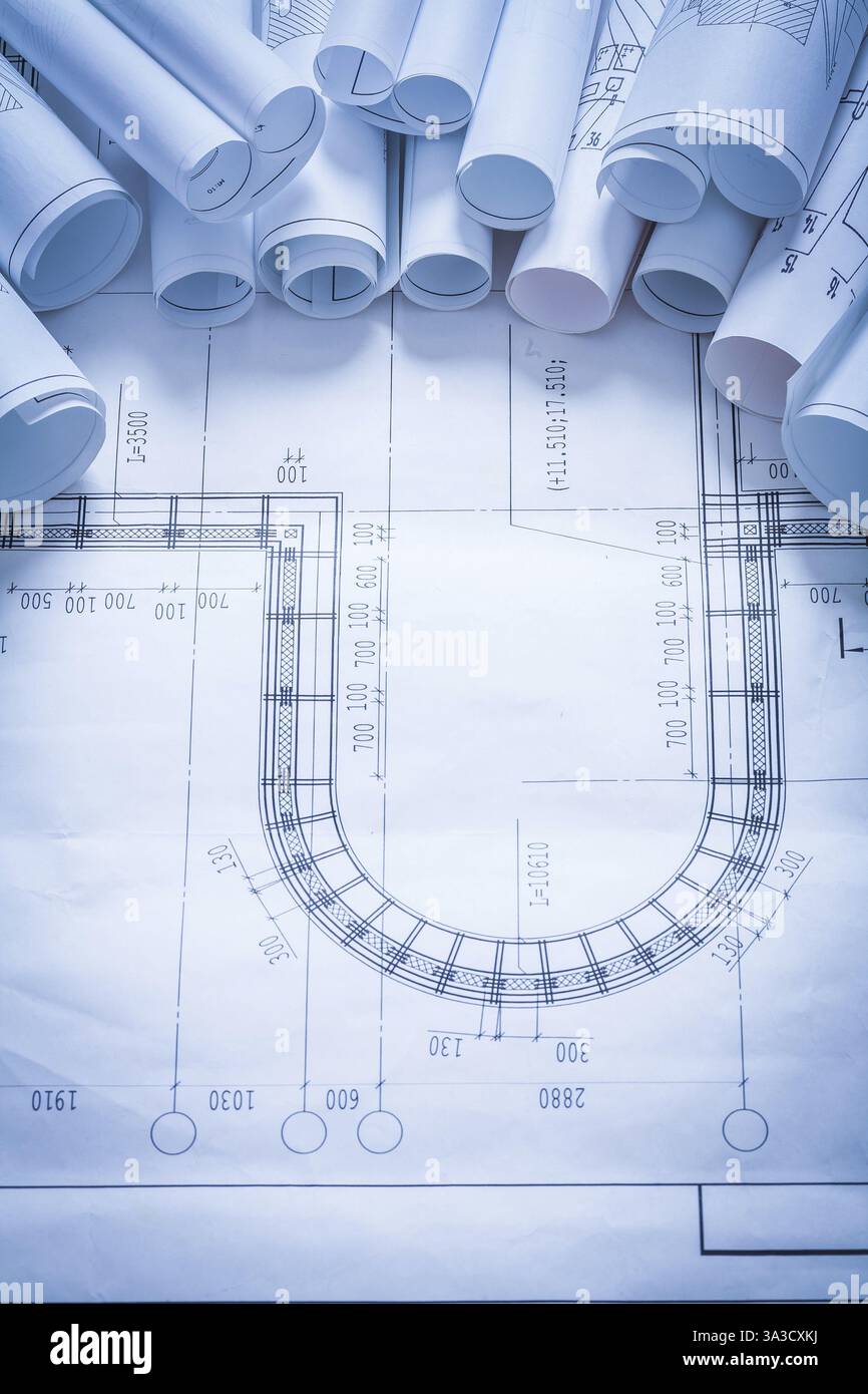 Stack of construction drawings maintenance concept Stock Photo - Alamy