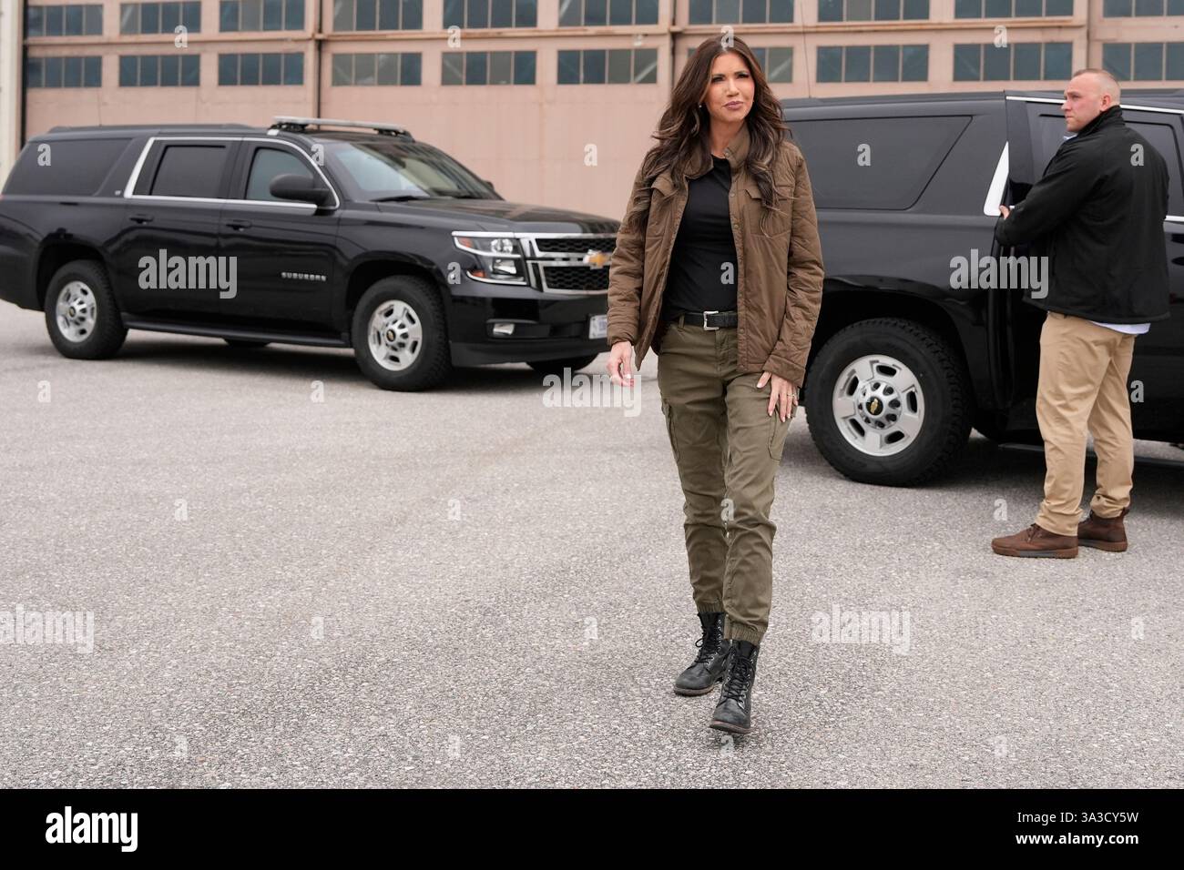 Homeland Security Secretary Kristi Noem arrives to board a plane at ...