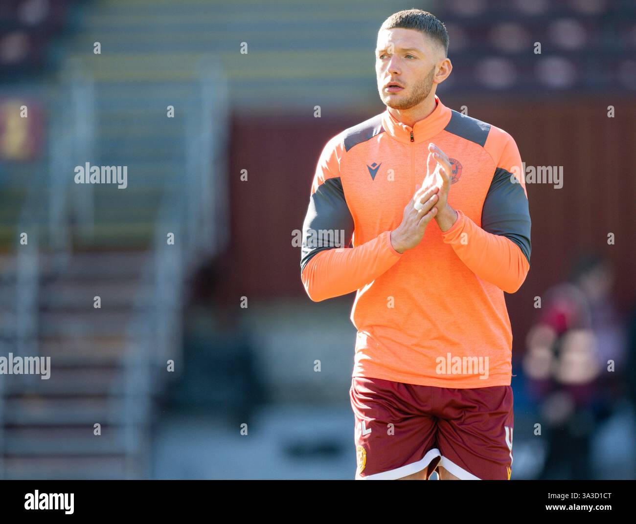MOTHERWELL, SCOTLAND - MARCH 15: Motherwell's Liam Gordon warms up ...