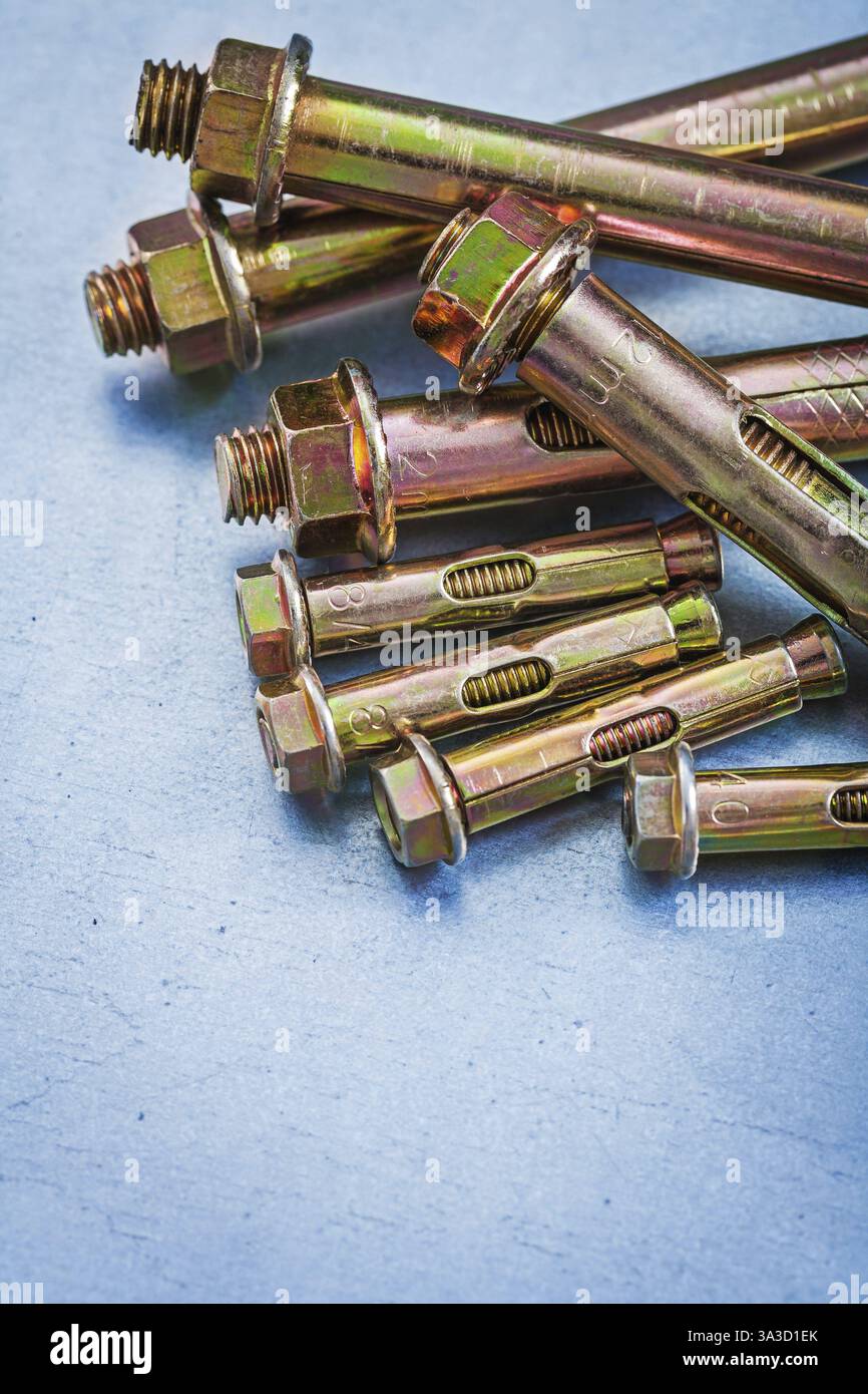 Variation of threaded anchor bolts with screw nuts on metallic ...