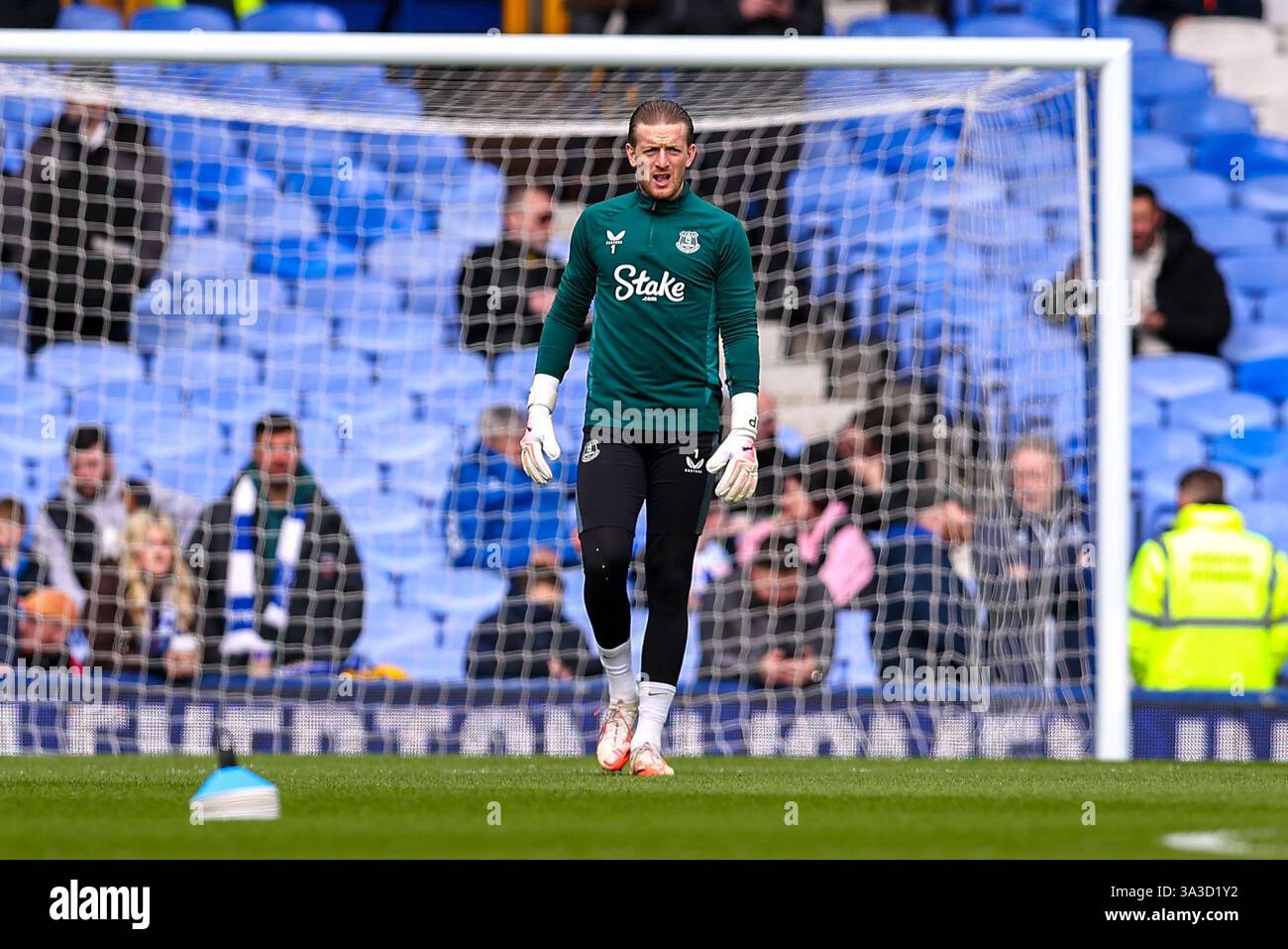 Liverpool, UK. 15th Mar, 2025. Jordan Pickford of Everton warms up ...