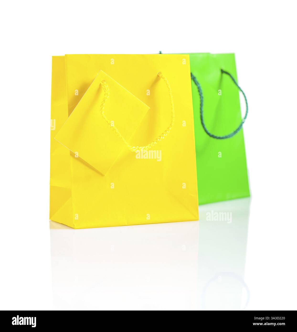 Yellow bag gift present Cut Out Stock Images & Pictures - Alamy