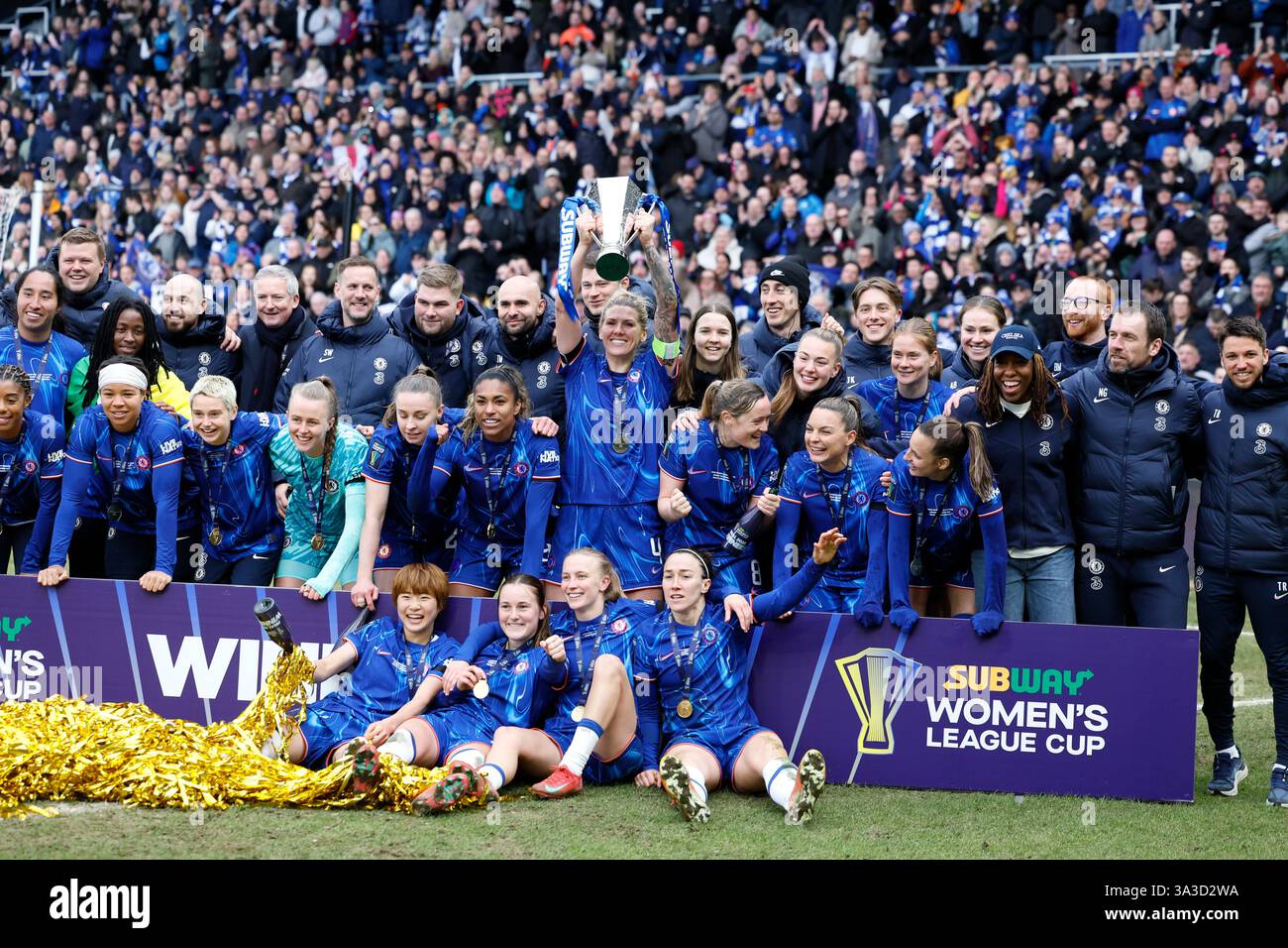 Chelsea players and staff celebrate with the trophy following the ...