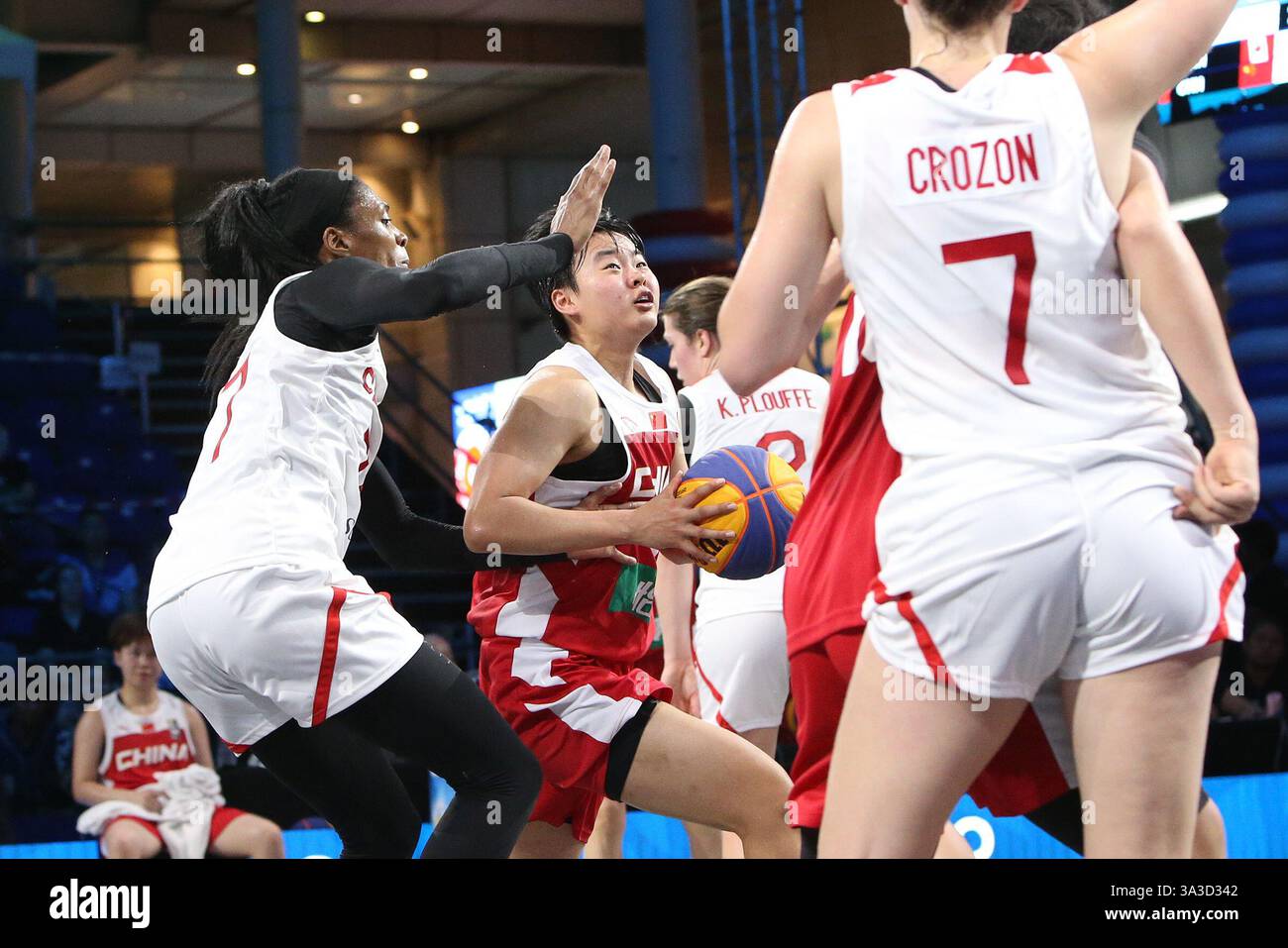 Bangkok, Thailand. 15th Mar, 2025. Li Wenxia (2nd L) of China breaks ...