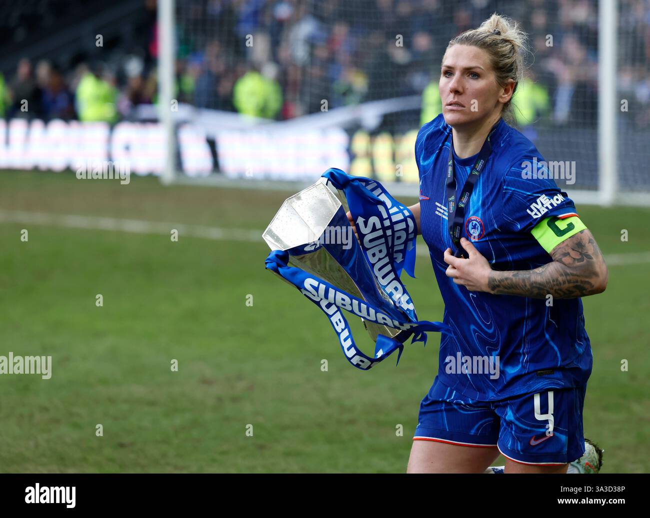 Chelsea's Millie Bright celebrates with the trophy following the Subway ...