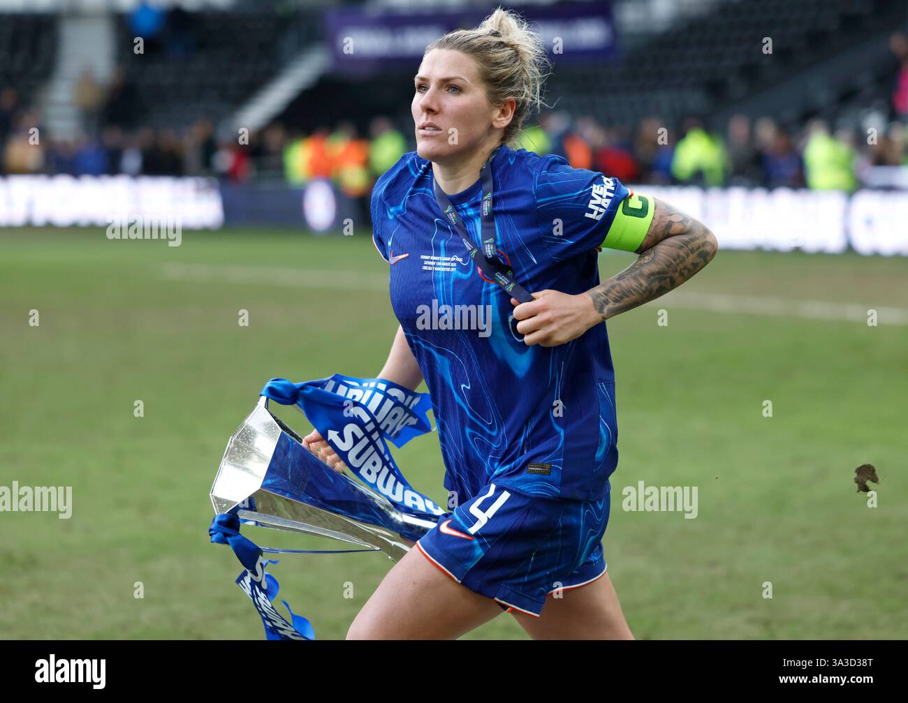 Chelsea's Millie Bright celebrates with the trophy following the Subway ...