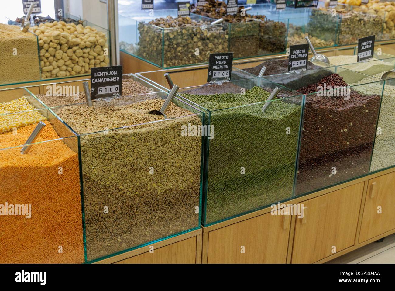 Bulk legumes for sale, with signs in Spanish, in a store Stock Photo ...