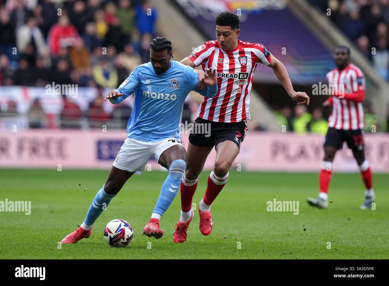 Coventry City's Haji Wright (left) and Sunderland's Jobe Bellingham ...