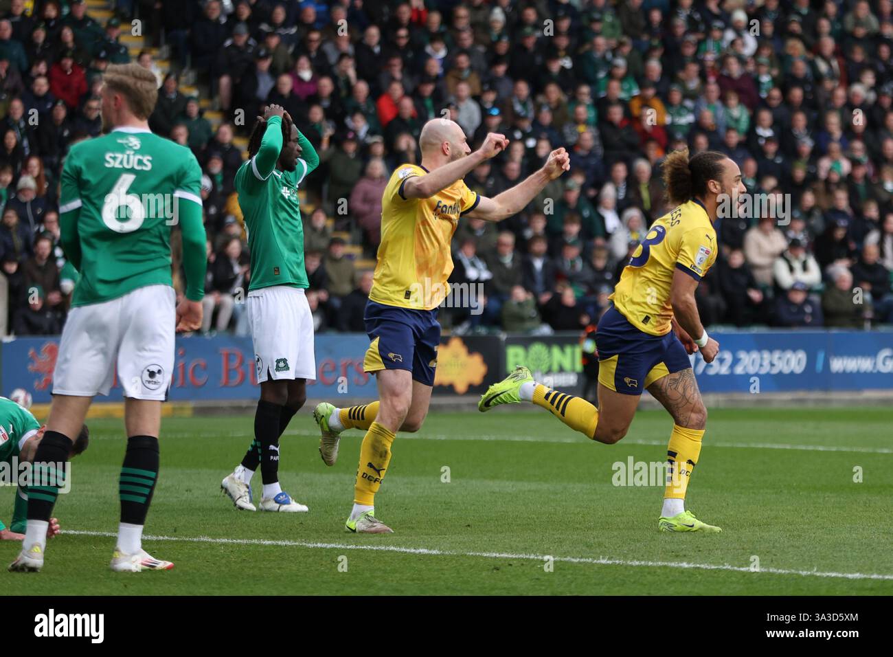 Derby County's Marcus Harness (right) celebrates scoring their side's ...