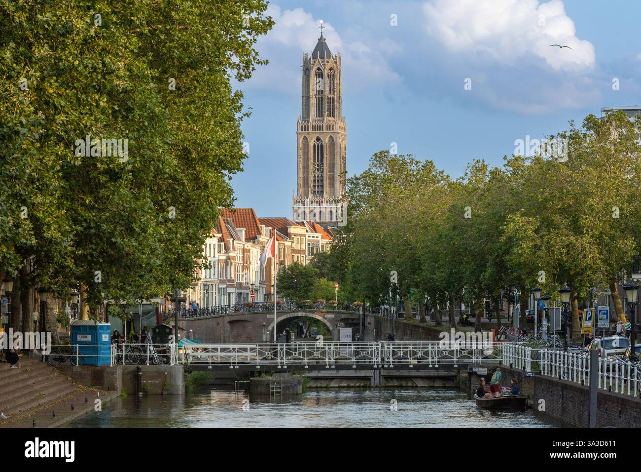 Dom Tower in Utrecht with historic buildings surrounded by trees and ...