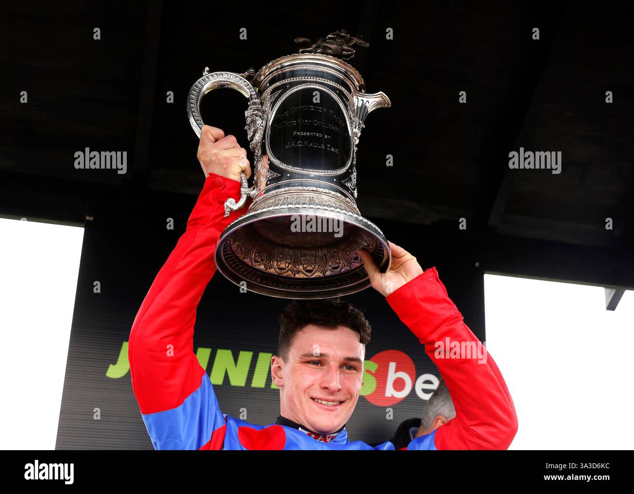 Jack Tudor lifts the trophy winning the JenningsBet Midlands Grand ...
