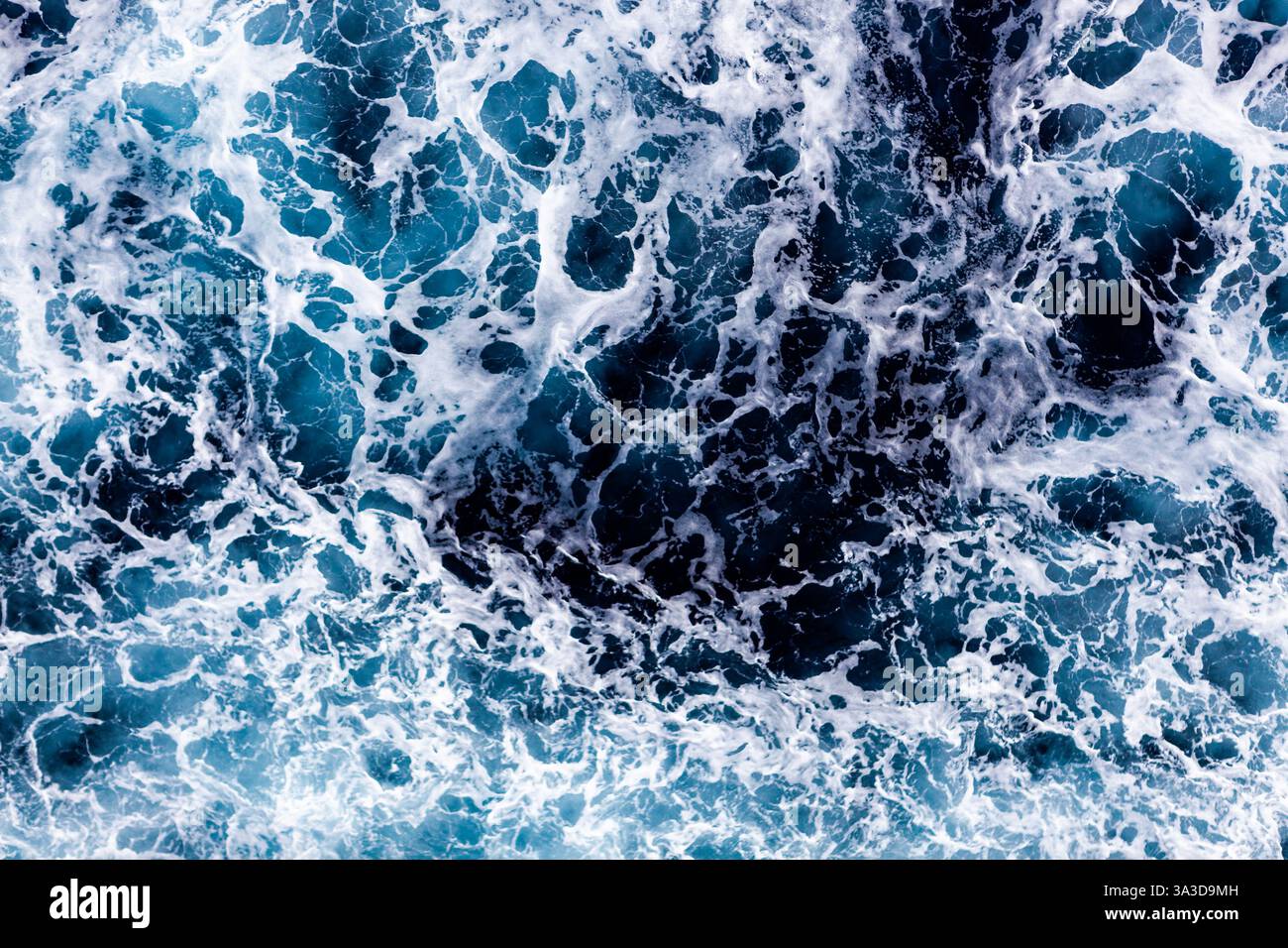 Ocean water texture. Top view of captivating water with foam. Can be ...