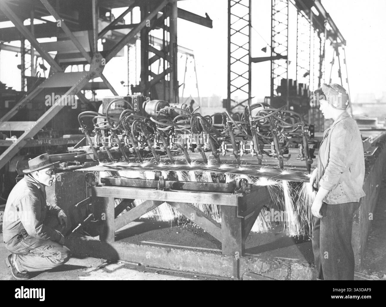 WWii women at work - manufacturing steel industry - Photo of man and ...