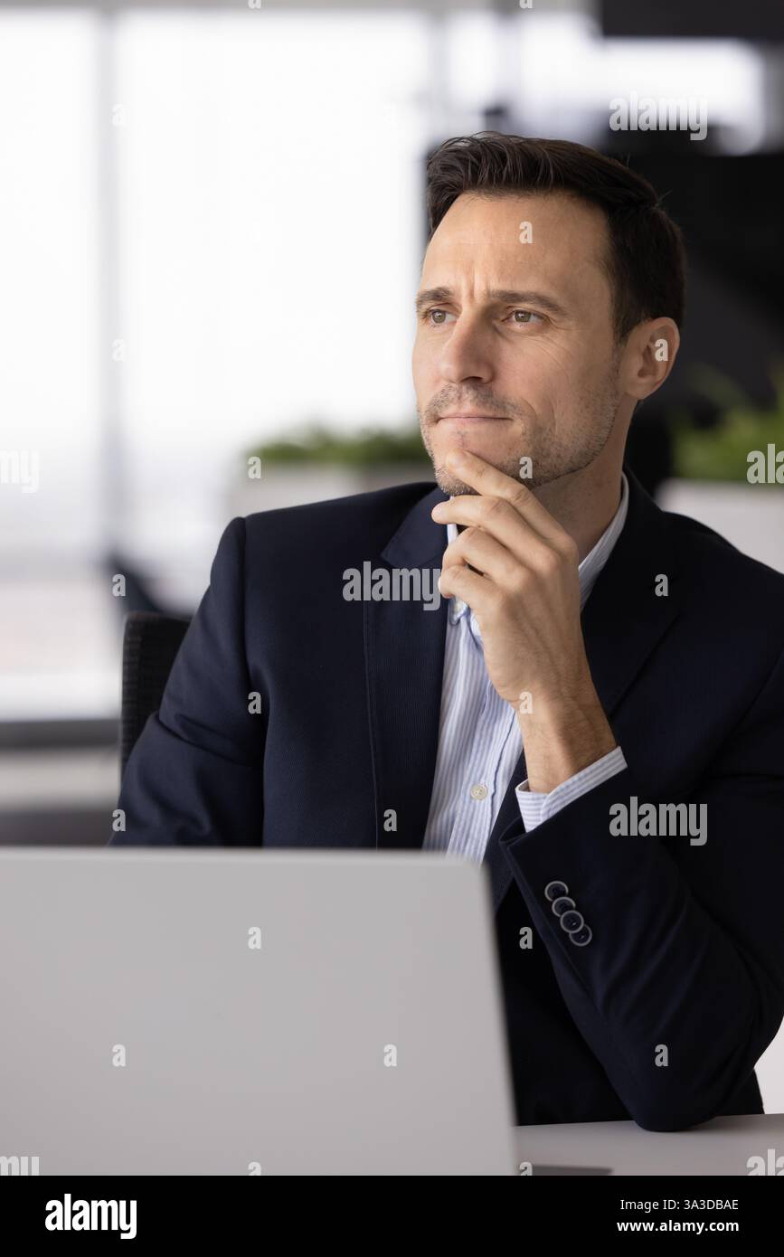Serious thoughtful executive man thinking on company management Stock ...