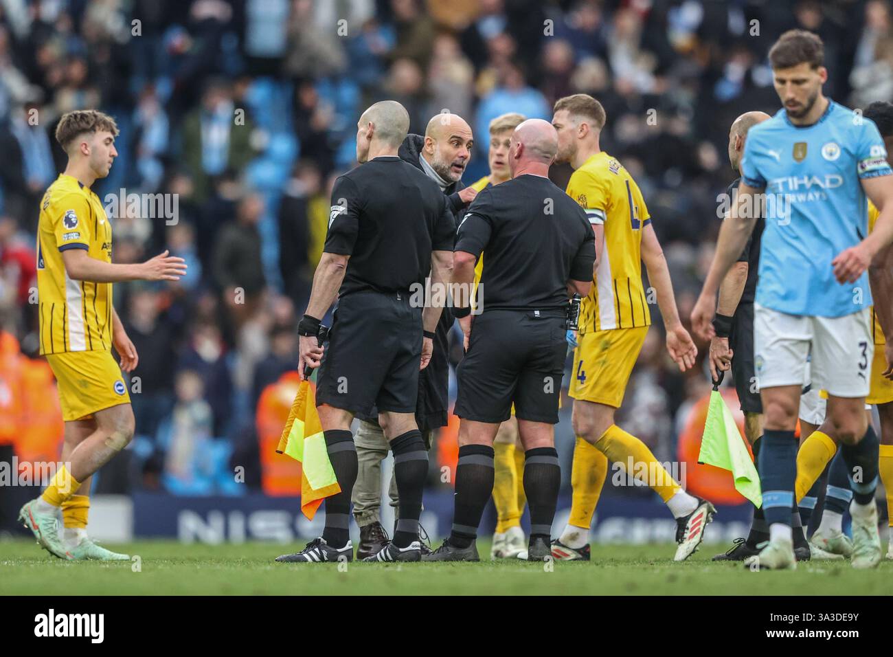 Pep Guardiola manager of Manchester City has a heated discussion with ...