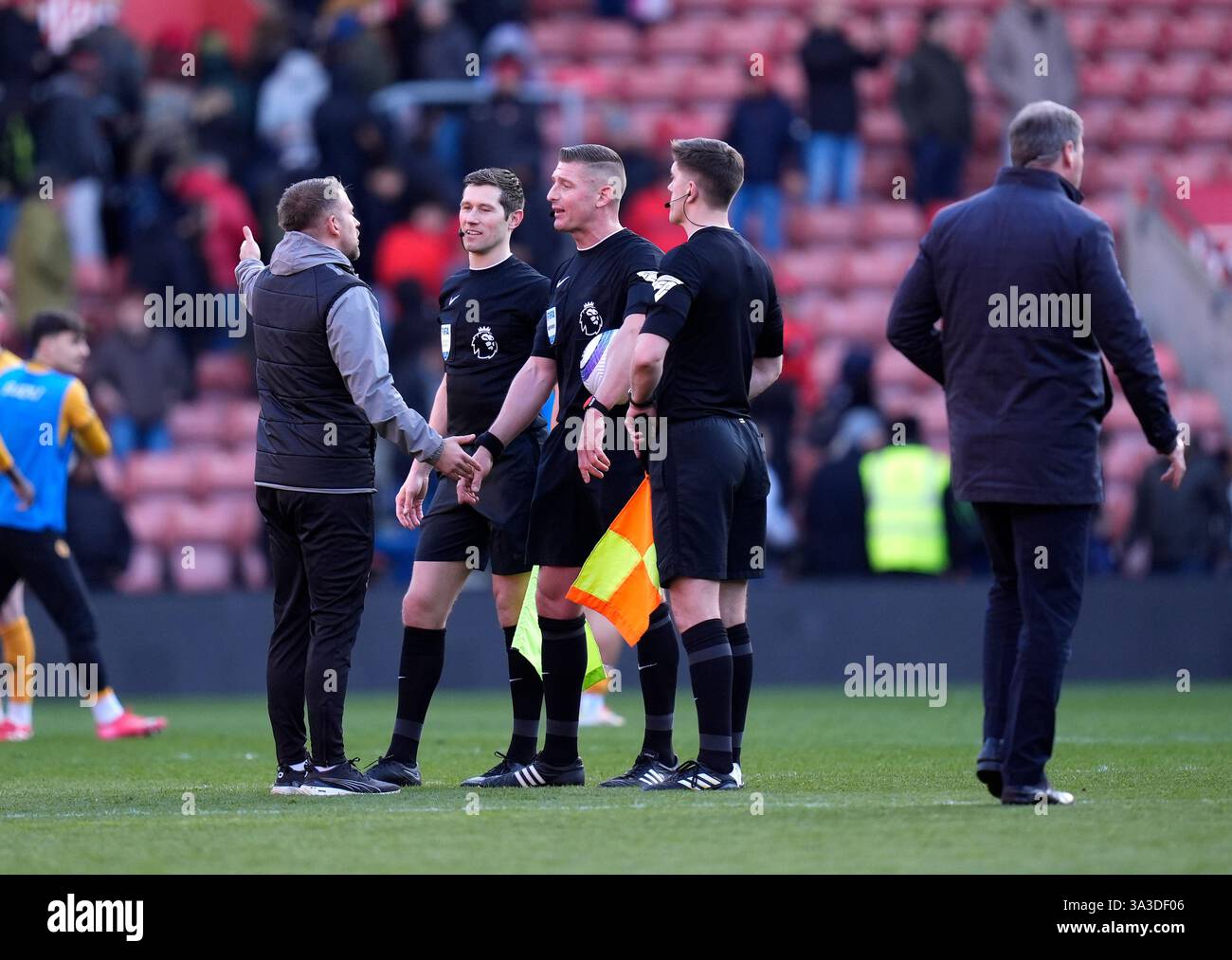 Southampton goalkeeping coach Dean Thornton addresses the officials ...