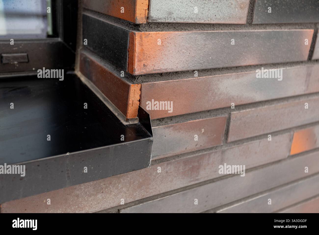 Detailed CloseUp of a Damaged Brick Wall Featuring Black Trim and ...