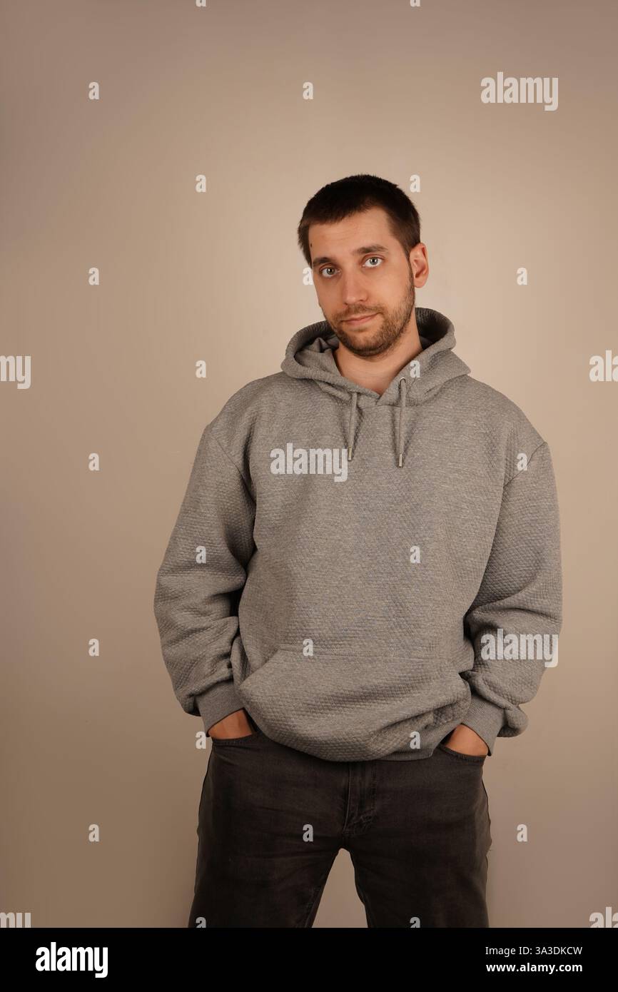 His relaxed posture highlights a carefree attitude. The expression adds ...