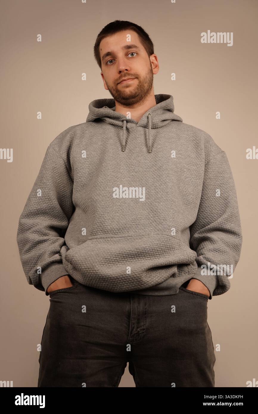 His relaxed posture highlights a carefree attitude. The expression adds ...