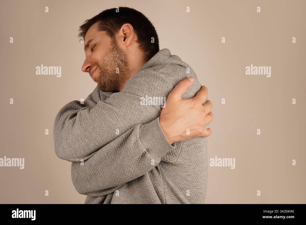 His expression suggests self-compassion and emotional connection. It s ...