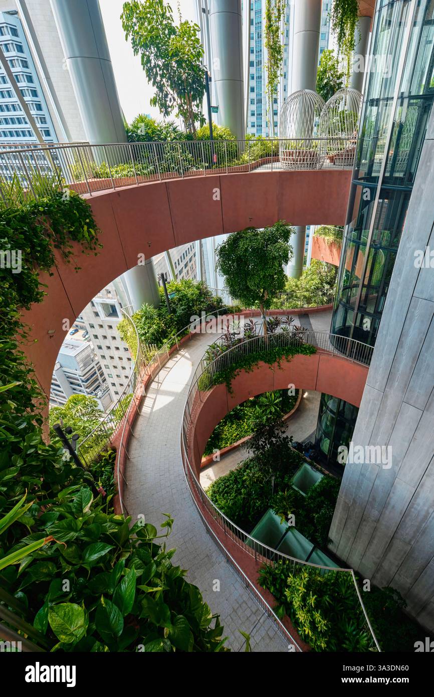 Singapore - August 16, 2024: CapitaSpring skyscraper with walkways and ...