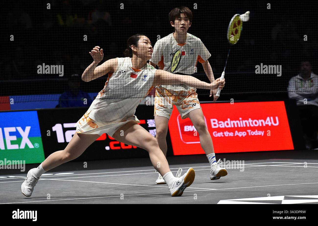 Jia Yi Fan, left, and Zhang Shu Xian of China in action during women's ...