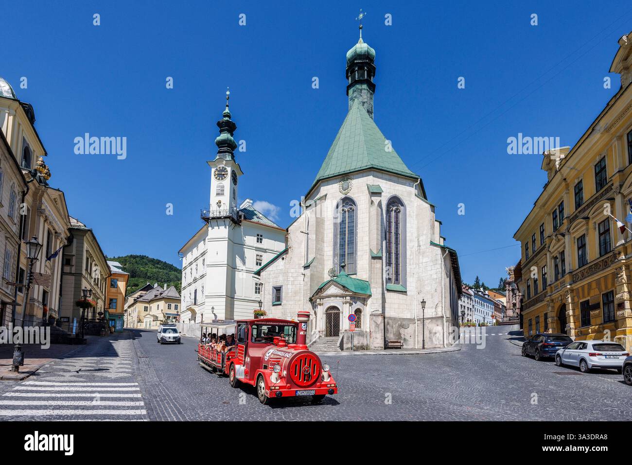 Tourist road train in front of Kostol sv. Kataríny, St Catherine's ...
