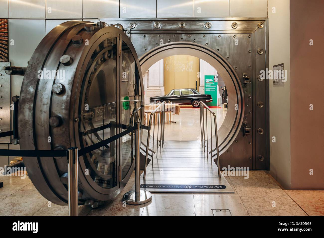 Lisbon, Portugal - January 2, 2025: A large bank vault door at the ...