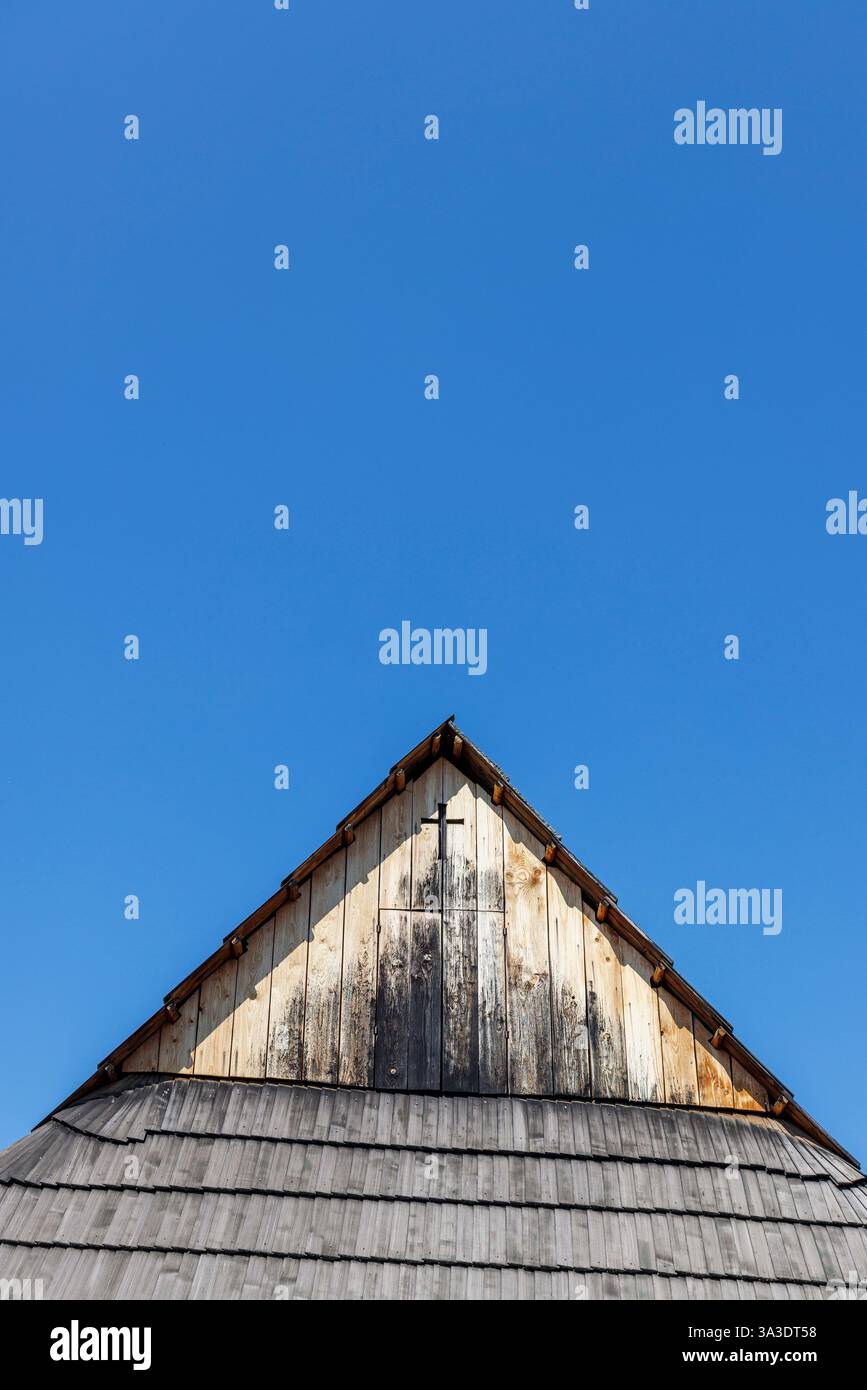 Cross cut into roof of olk architecture village house, Vlkolinec ...