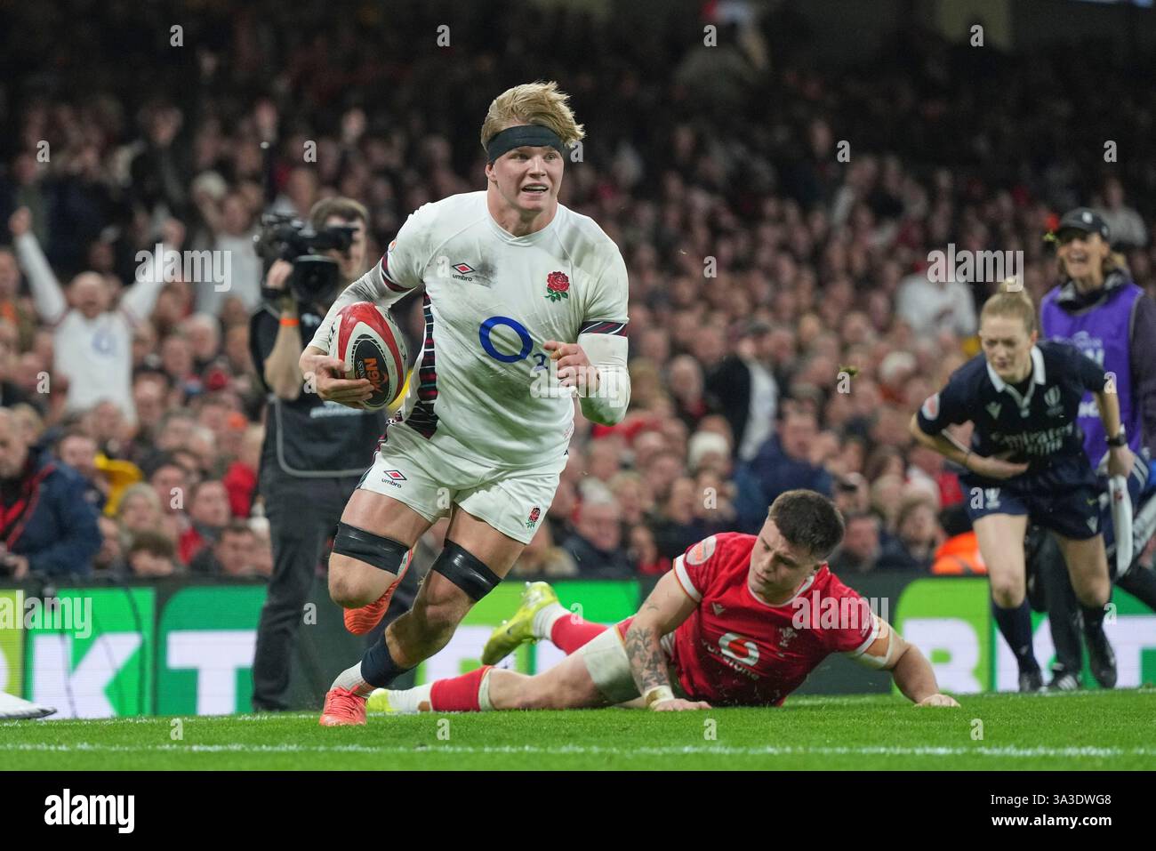 England's Henry Pollock crosses to score a try during the Six Nations ...