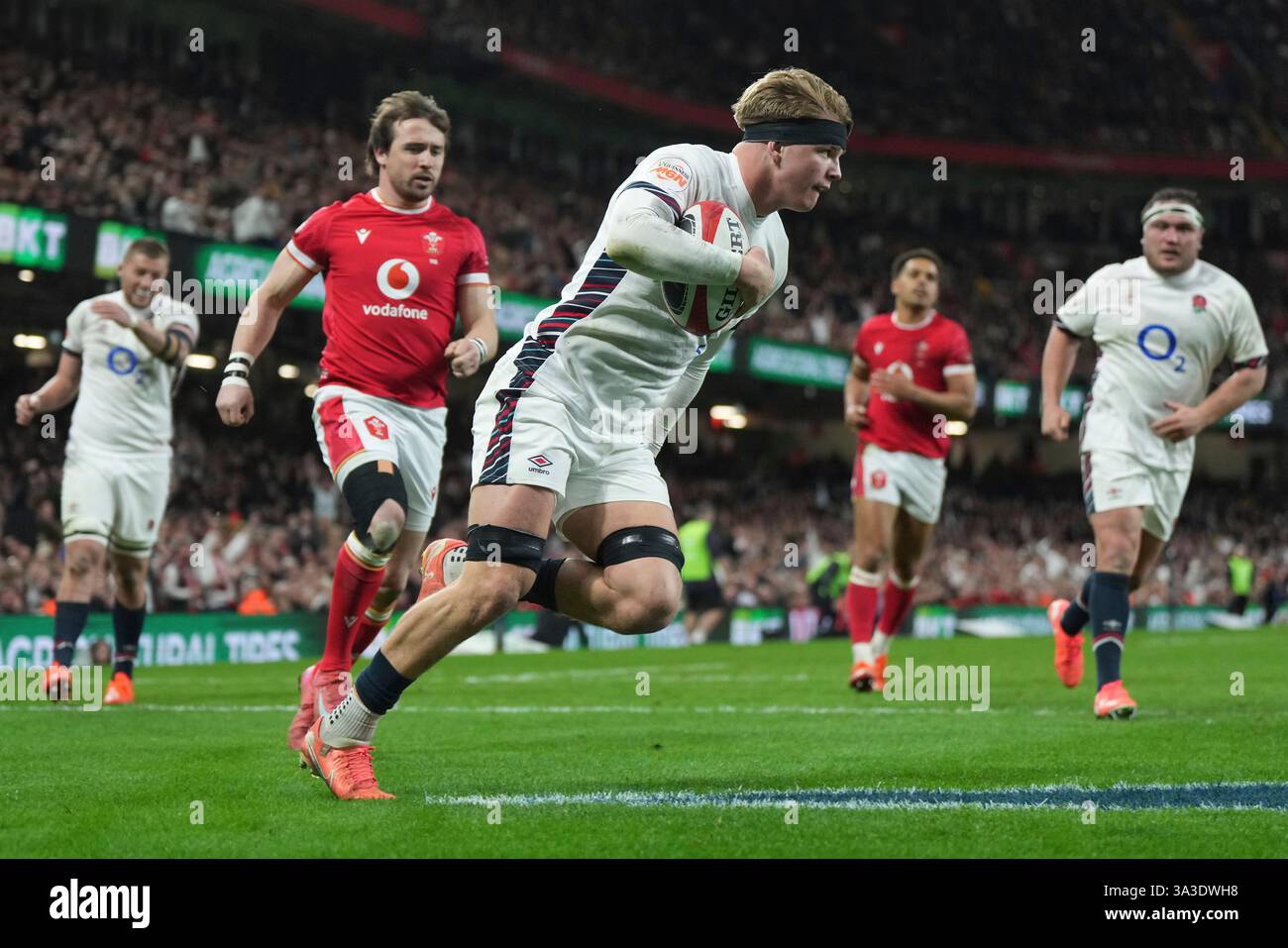England's Henry Pollock crosses to score a try during the Six Nations ...
