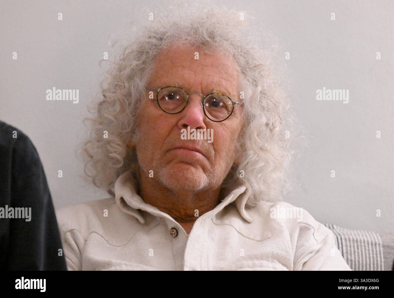 Munich, Germany. 14th Mar, 2025. Rainer Langhans sits at a photo shoot ...