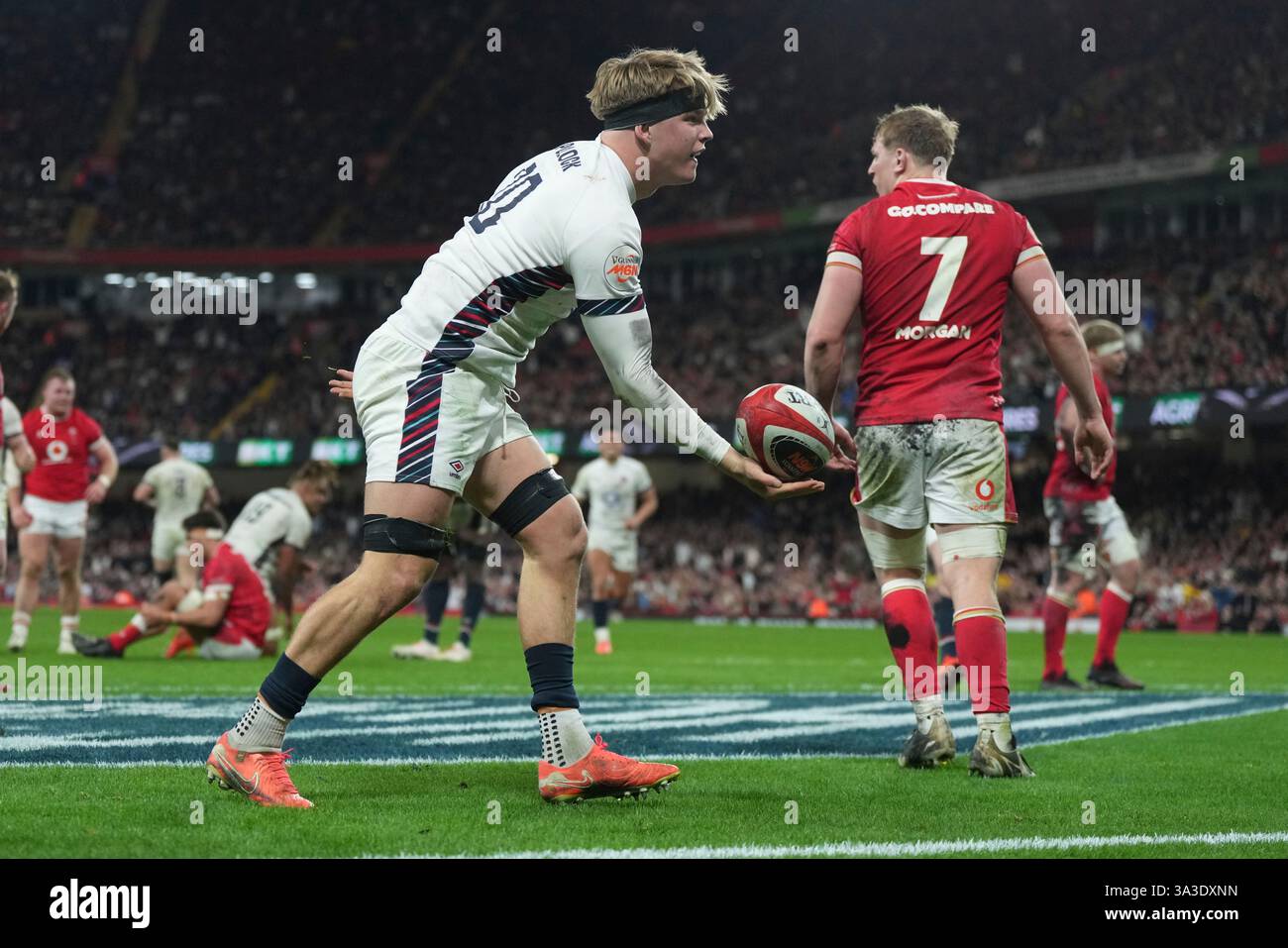 England's Henry Pollock reacts after crossing to score a try during the ...