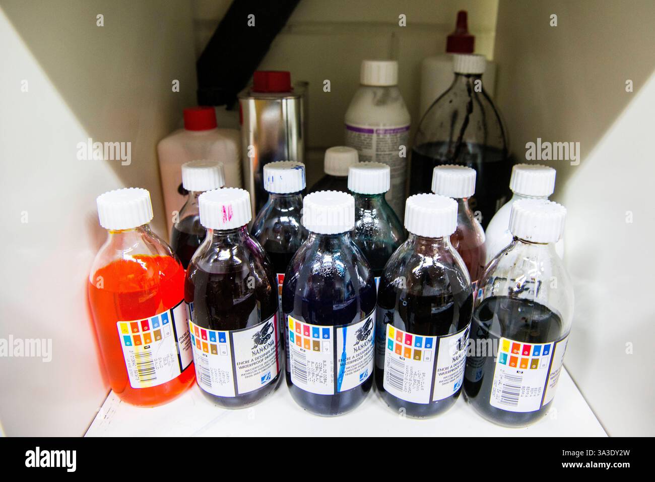 Bottles and Chemicals Goirle, Netherlands. Multiple bottles with pickle ...