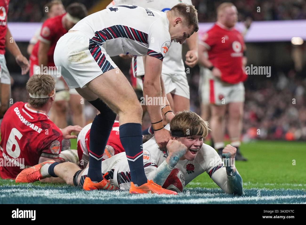 England's Henry Pollock celebrates after crossing to score a try during ...