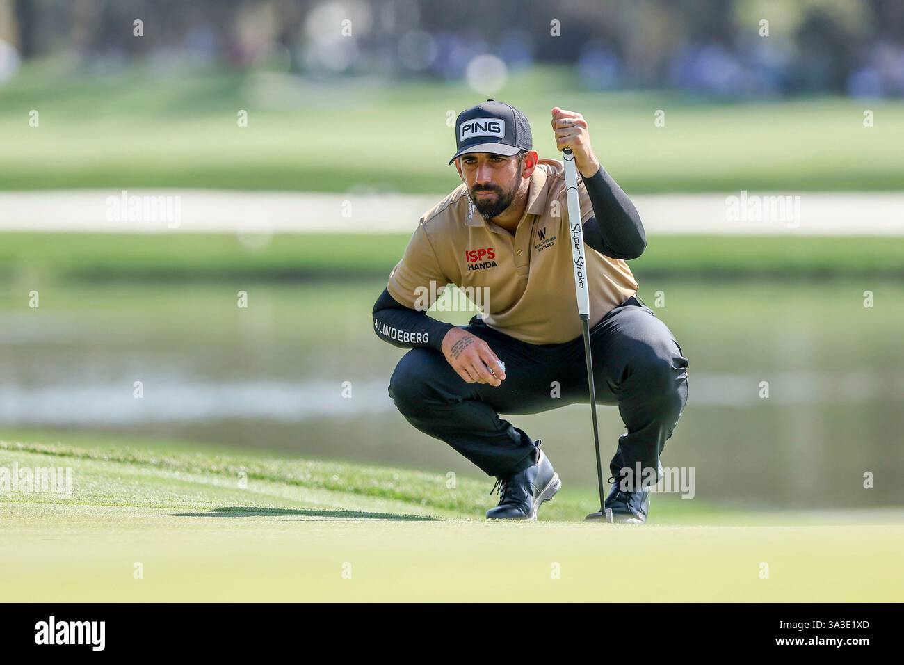 March 15, 2025: Matthieu Pavon sizes up his putt on the 6th hole during ...