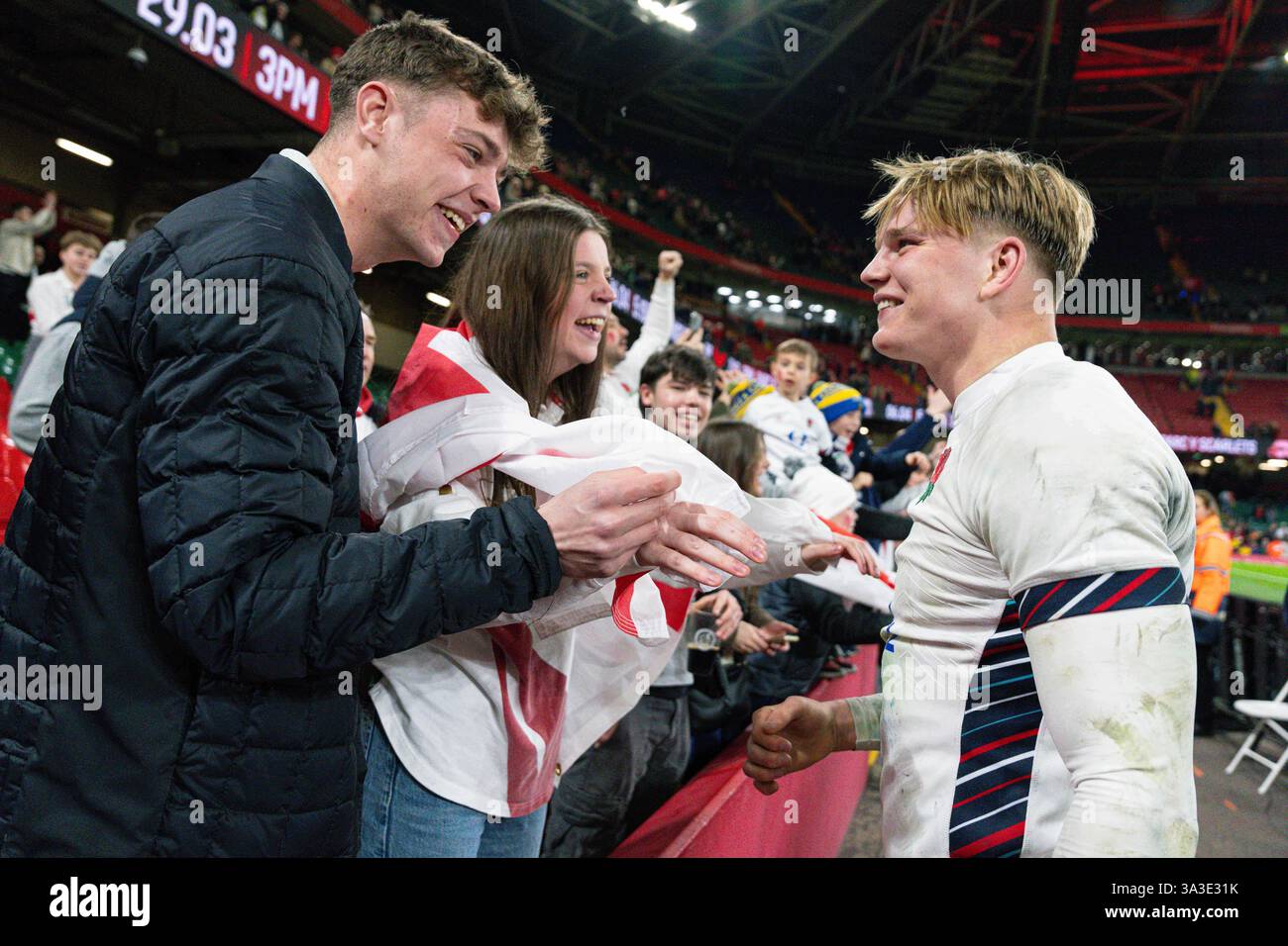 Henry Pollock of England embraces members of the crowd at the final ...