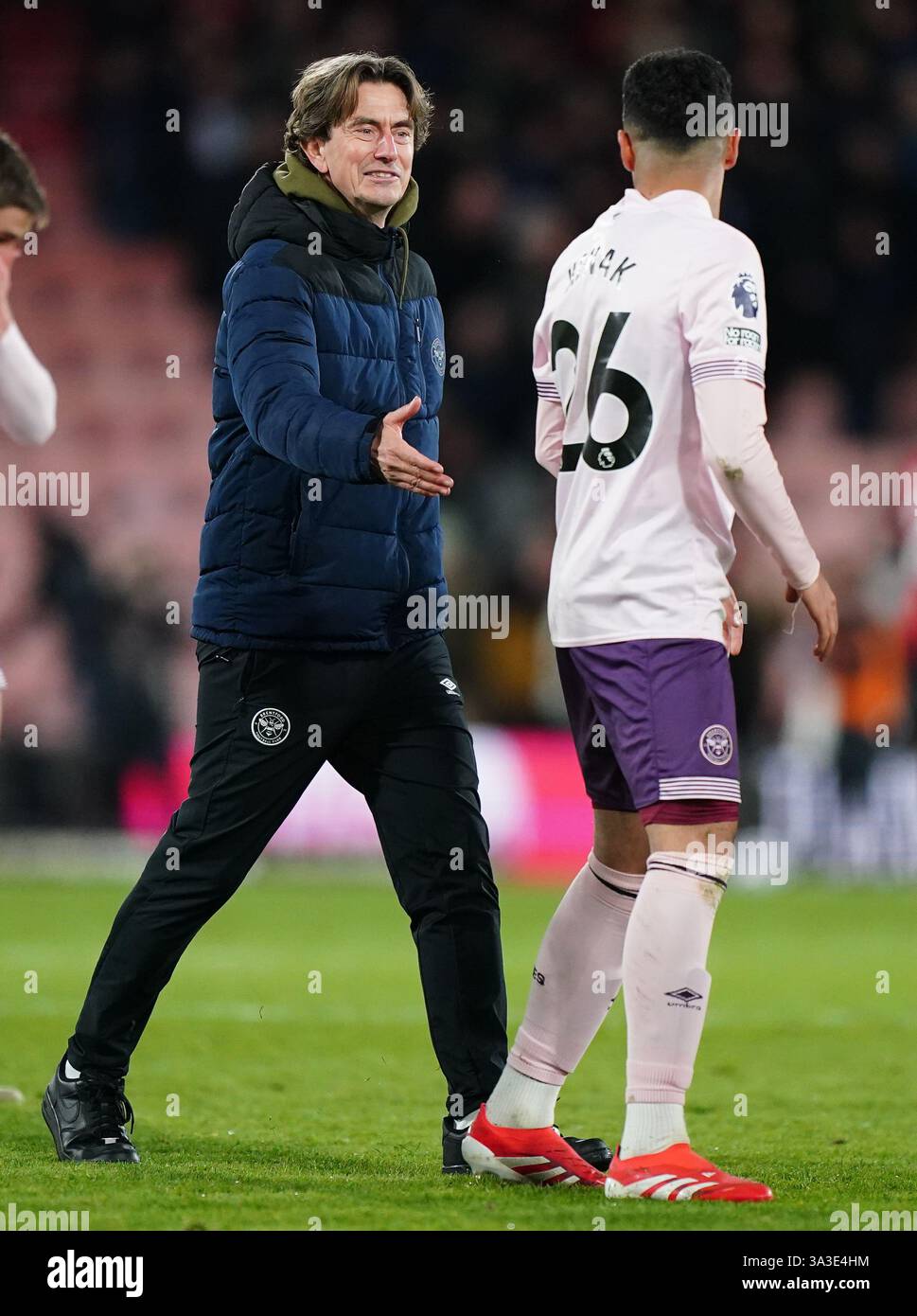 Brentford manager Thomas Frank (left) and Brentford's Yunus Emre Konak ...