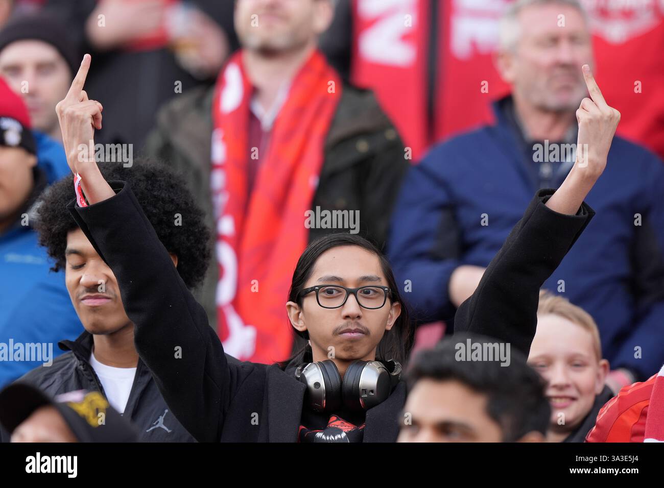 Toronto, Canada. 15th Mar, 2025. A Toronto FC fan gives the middle ...